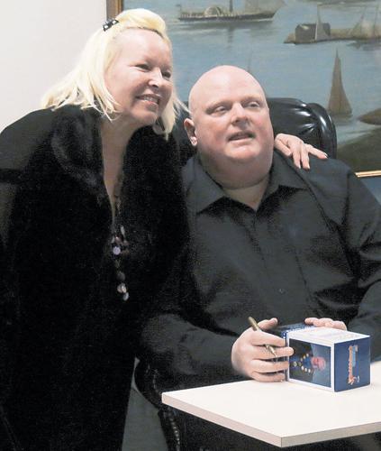 Rob Ford updates condition, signs bobble head dolls at city hall