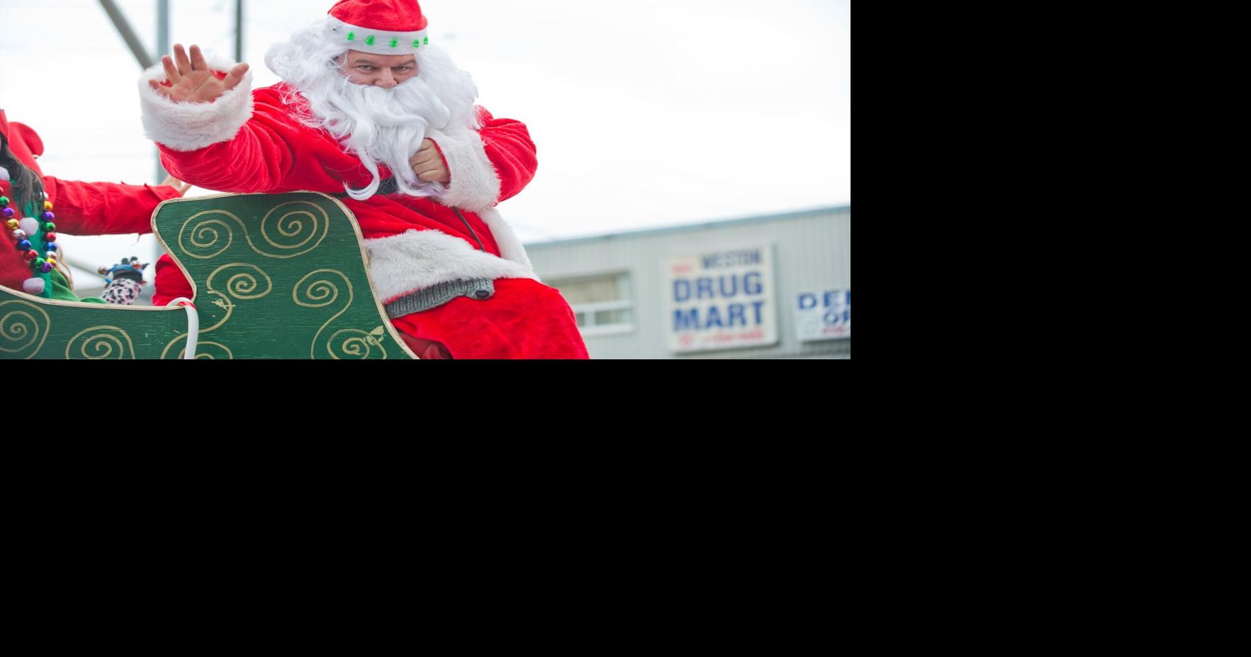 Santa Claus parades through Weston Village