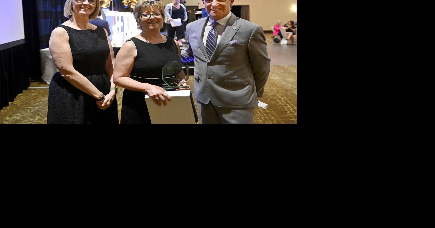 Osler awards Candace Barone community service award