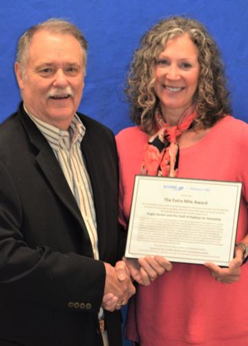 Angie Hunter presented 'Extra Mile Award' | Lifestyles ...