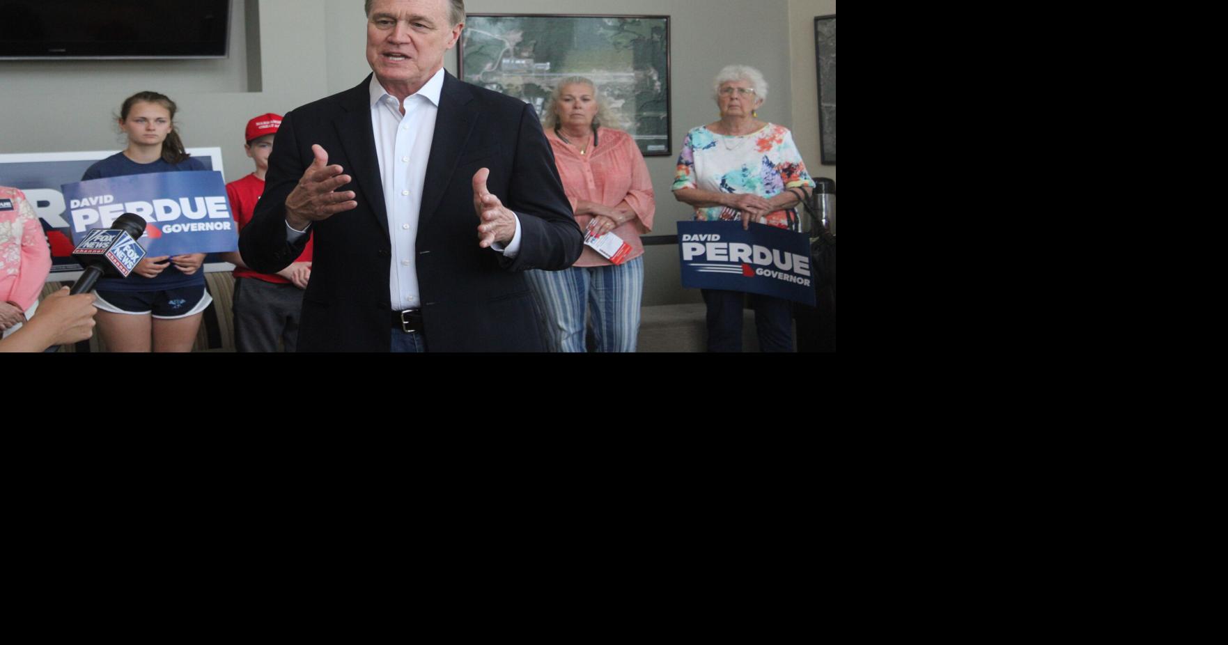 'A race between people and politicians': David Perdue visits Ball ...
