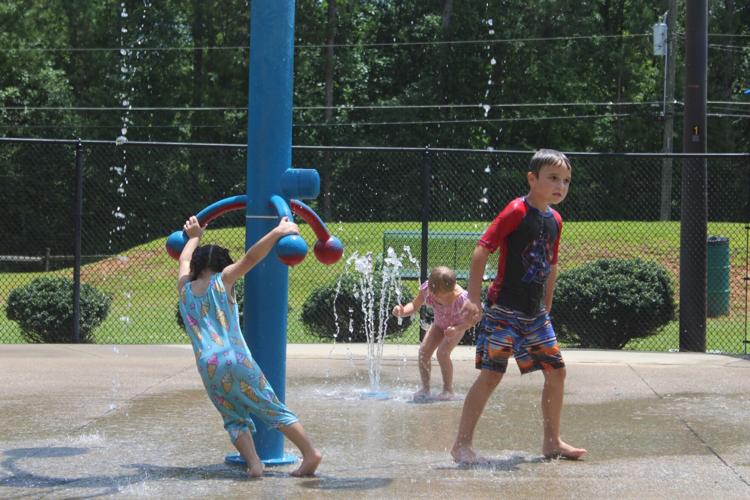 Families cool off at Cline Park Splash Pad in Waleska | Lifestyle ...