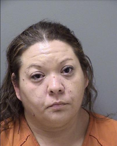 Marietta woman sentenced for shoplifting, dragging officer with car ...