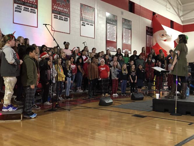Teasley Middle School students show holiday spirit and donates ...