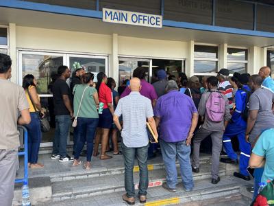 RUSH AT LICENSING | Local News | trinidadexpress.com