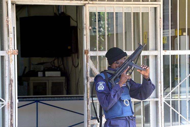 Shots fired at police station after three killed | Local News ...