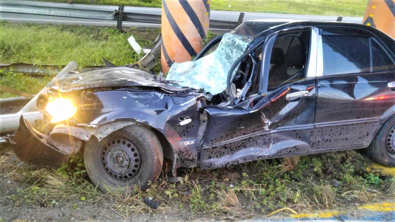 Lucky to survive: Car crushed as truck hit overpass | Local News ...