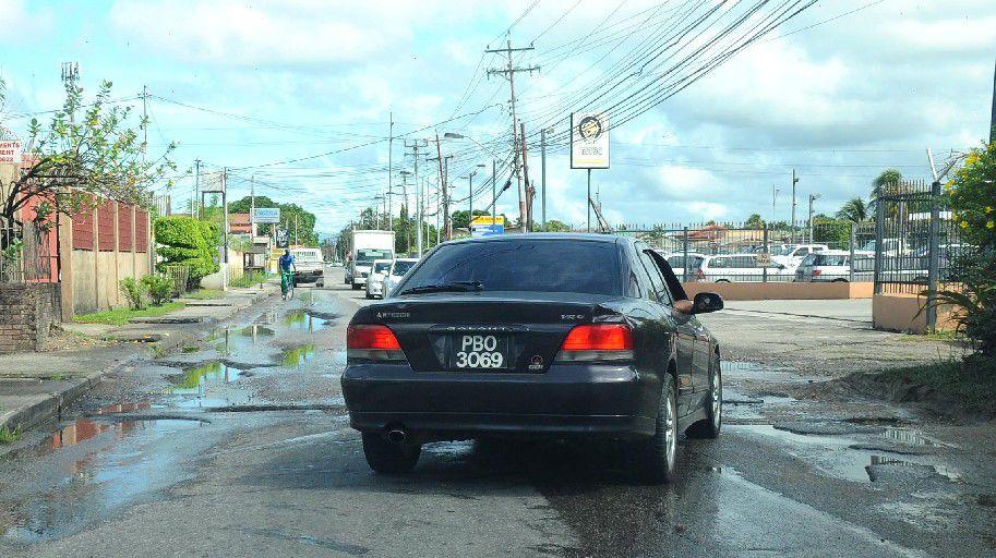 Pothole traffic jams in Central Trinidad | Local News | trinidadexpress.com