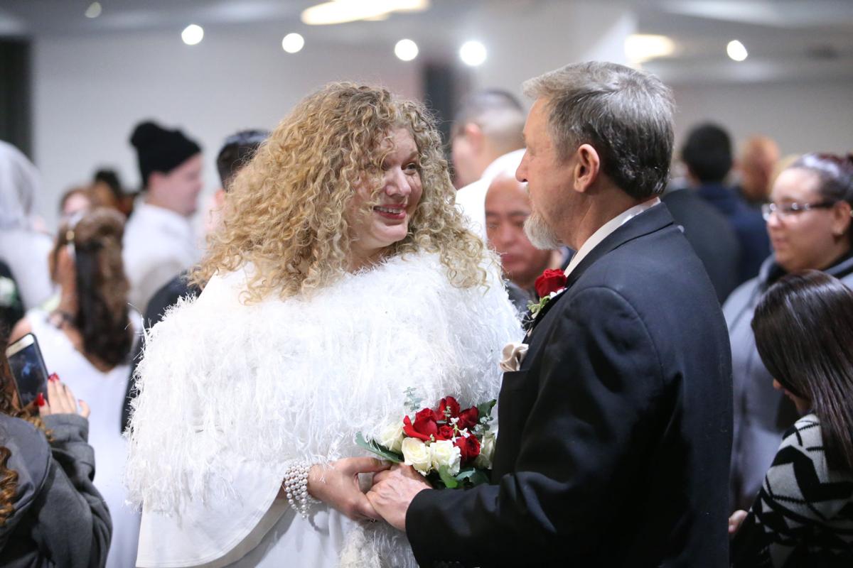 Photo gallery: Couples ring in new year with group wedding | Latest ...