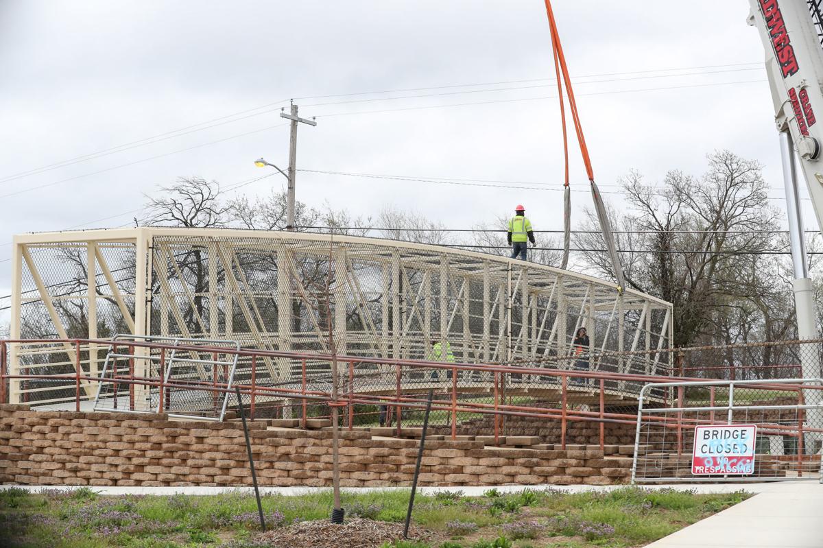 Pedestrian bridge on Martin Luther King Jr. Boulevard replaced | Local ...