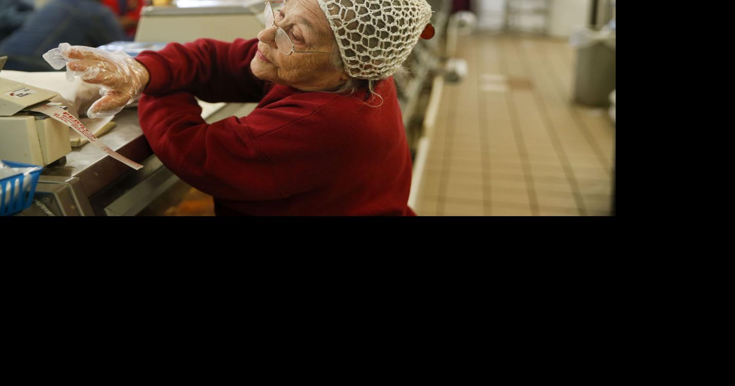 Workforce: Perry's meat cutter Janice Hinkle enjoys her customers