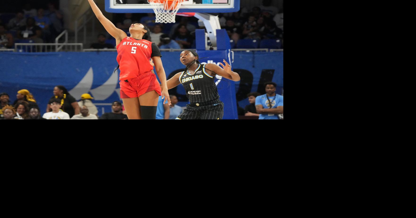 Atlanta Dream forward Angel Reese (5) is defended by Chicago Sky center ...