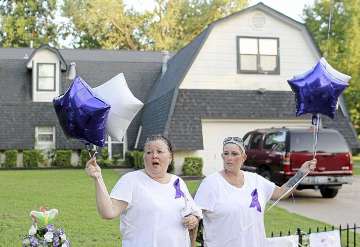 Broken Arrow residents hold vigil for slain, surviving Bever family members