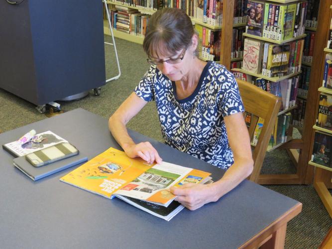 Collinsville Library reopens after major remodel with improved look ...