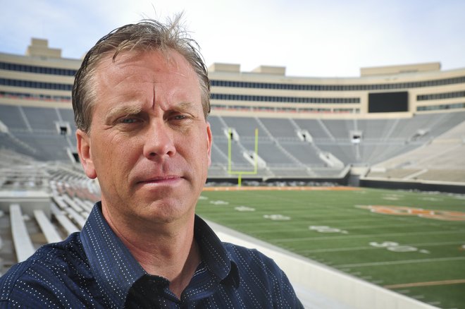 Mike Gundy takes a televised step in restoring his logo