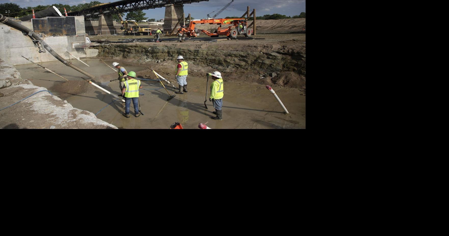 As pedestrian bridge comes down, new Zink Dam goes up