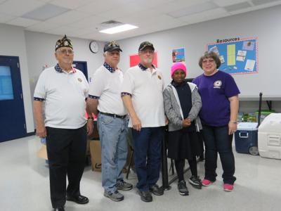 Local American Legion Post donates hats, gloves to Tulsa elementary school