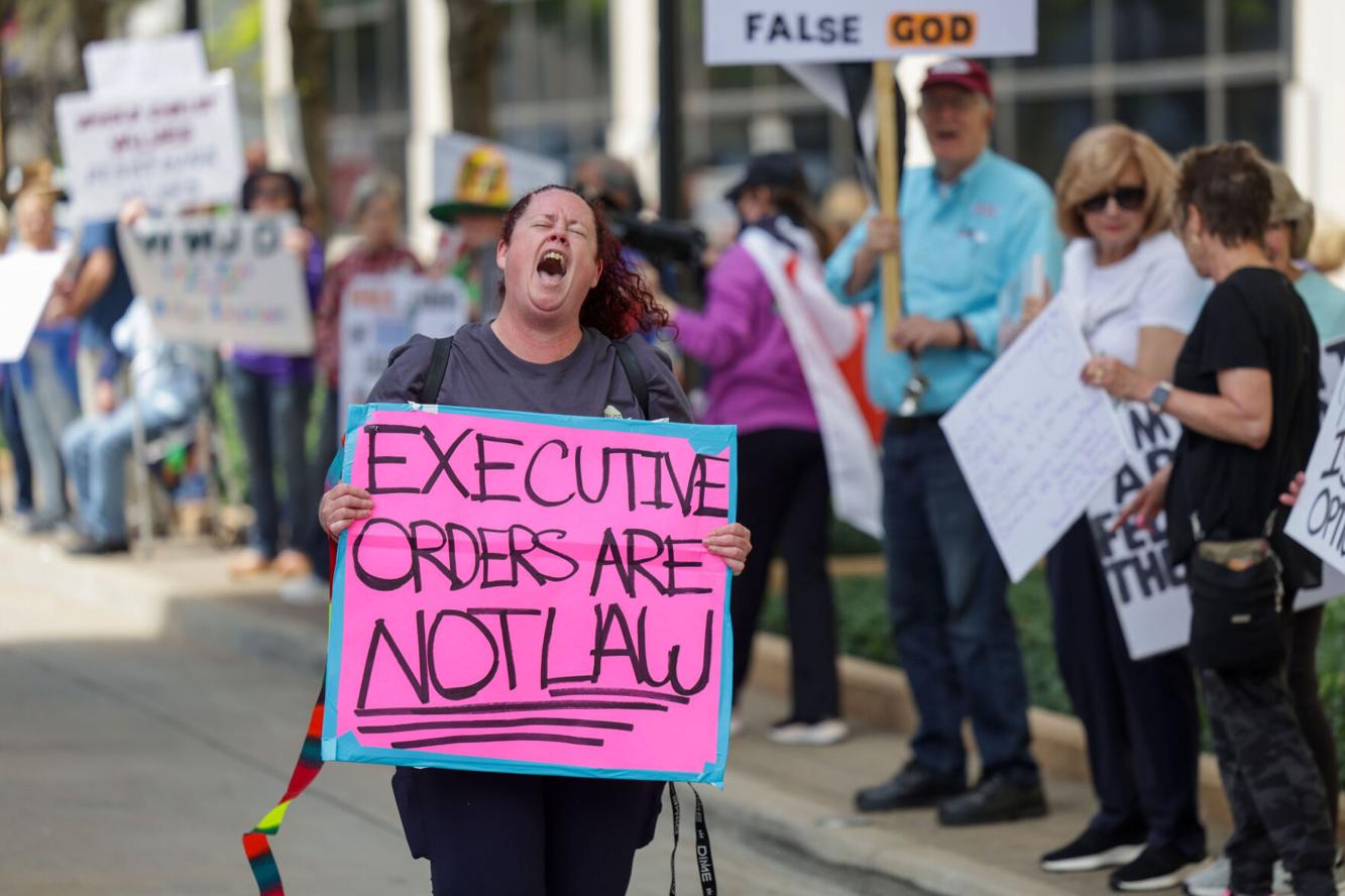 Photos: Protesters gather as Sen. James Lankford speaks downtown