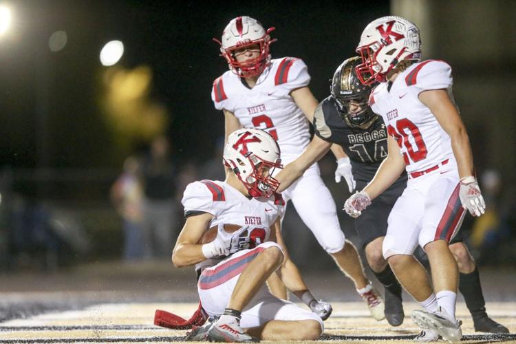 Brayden Barber's 4 TDs lead Kiefer to 28-14 win at Beggs