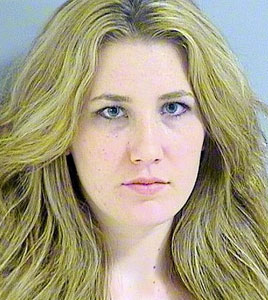 Defendants seek stay of civil suit until murder case is resolved