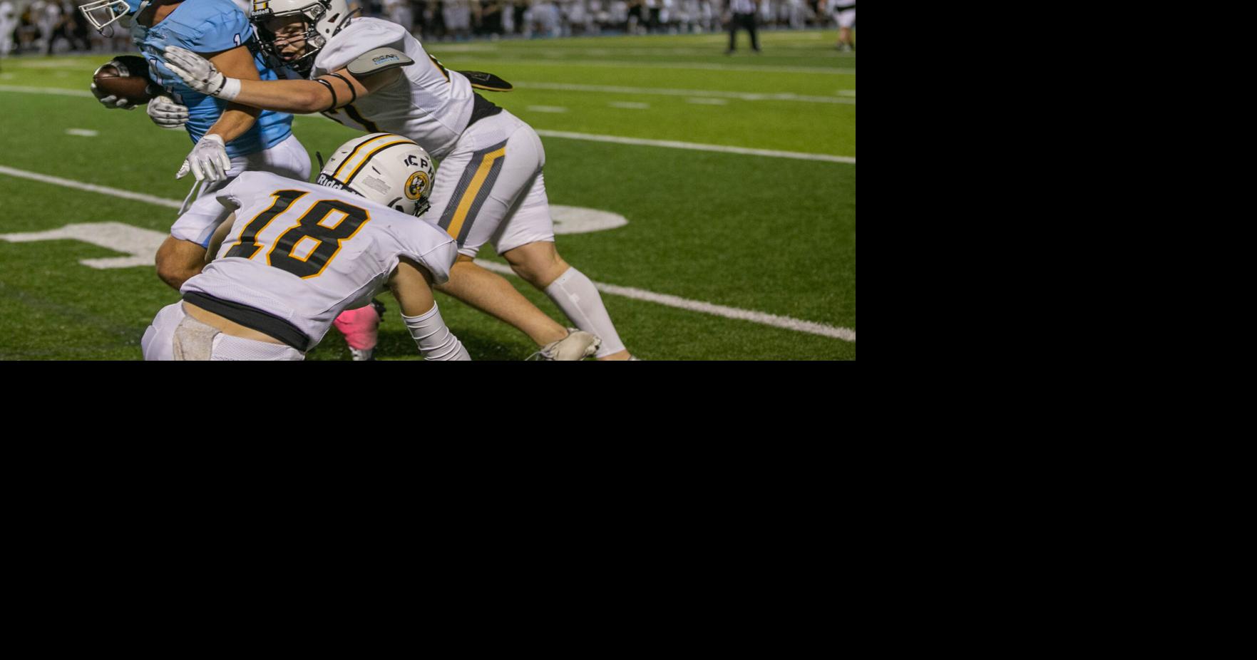 Photos: Bruins suffer overtime homecoming loss to Sandites, 36-29