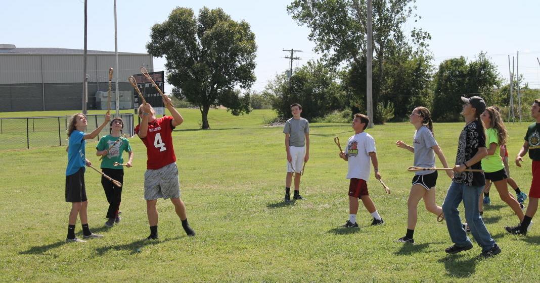 High school students learn Cherokee stick ball