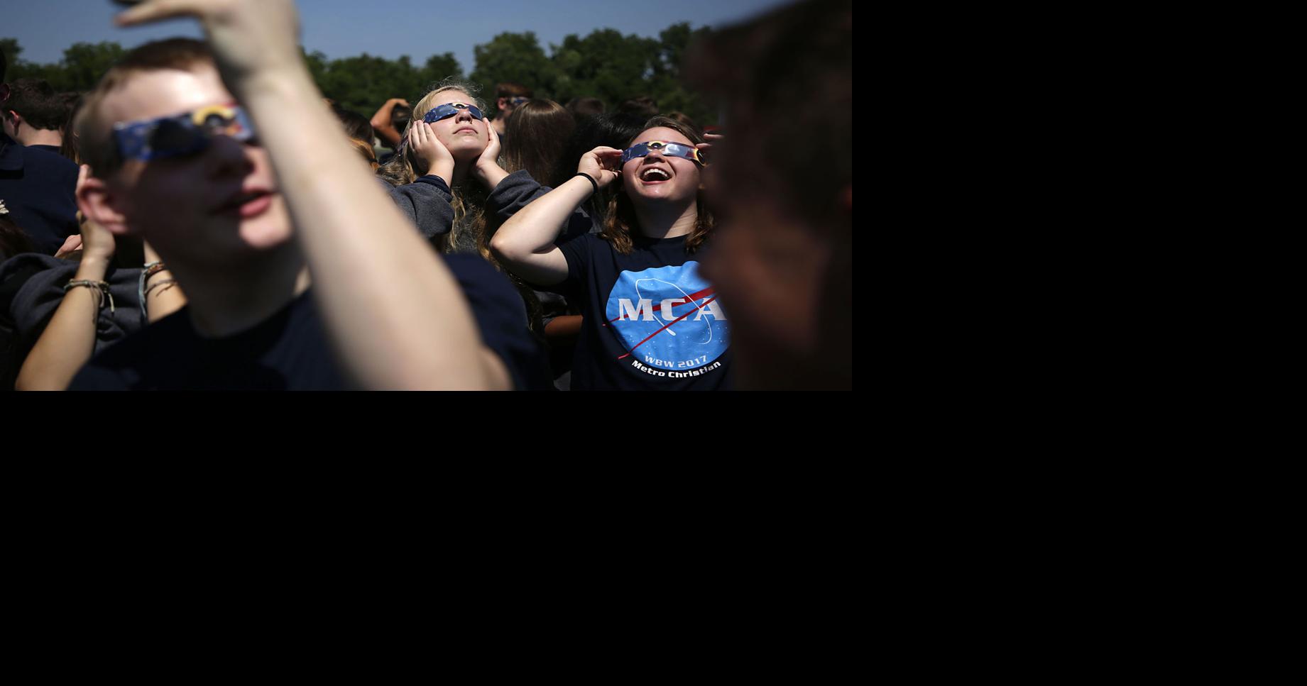 See the eclipse through the eyes of the Tulsans who stopped to watch