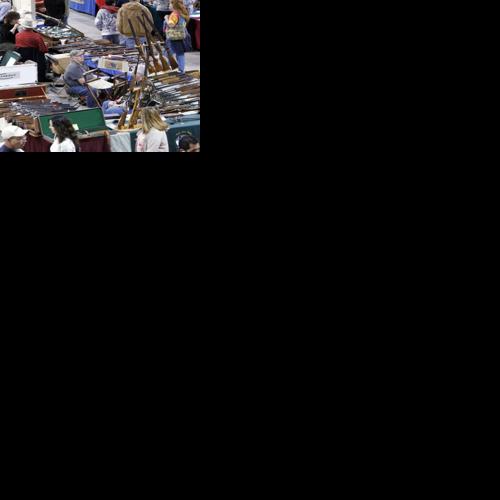 Gun sales slide at firearms exhibition