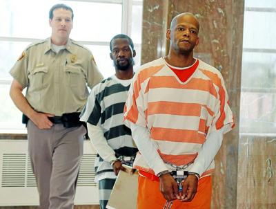 New trial date set for defendant in quadruple-murder case