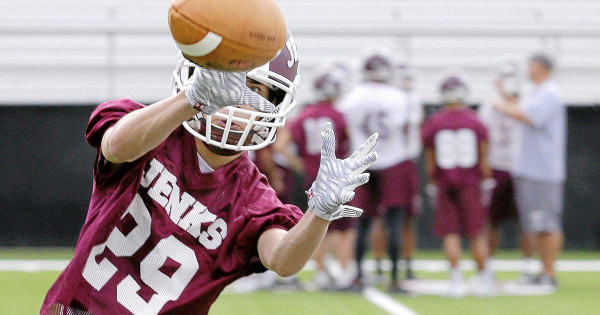 High schools: Jenks opens fall football practice early with light rain