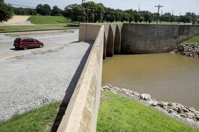 Gov. Stitt backs $50M funding for Arkansas River levee