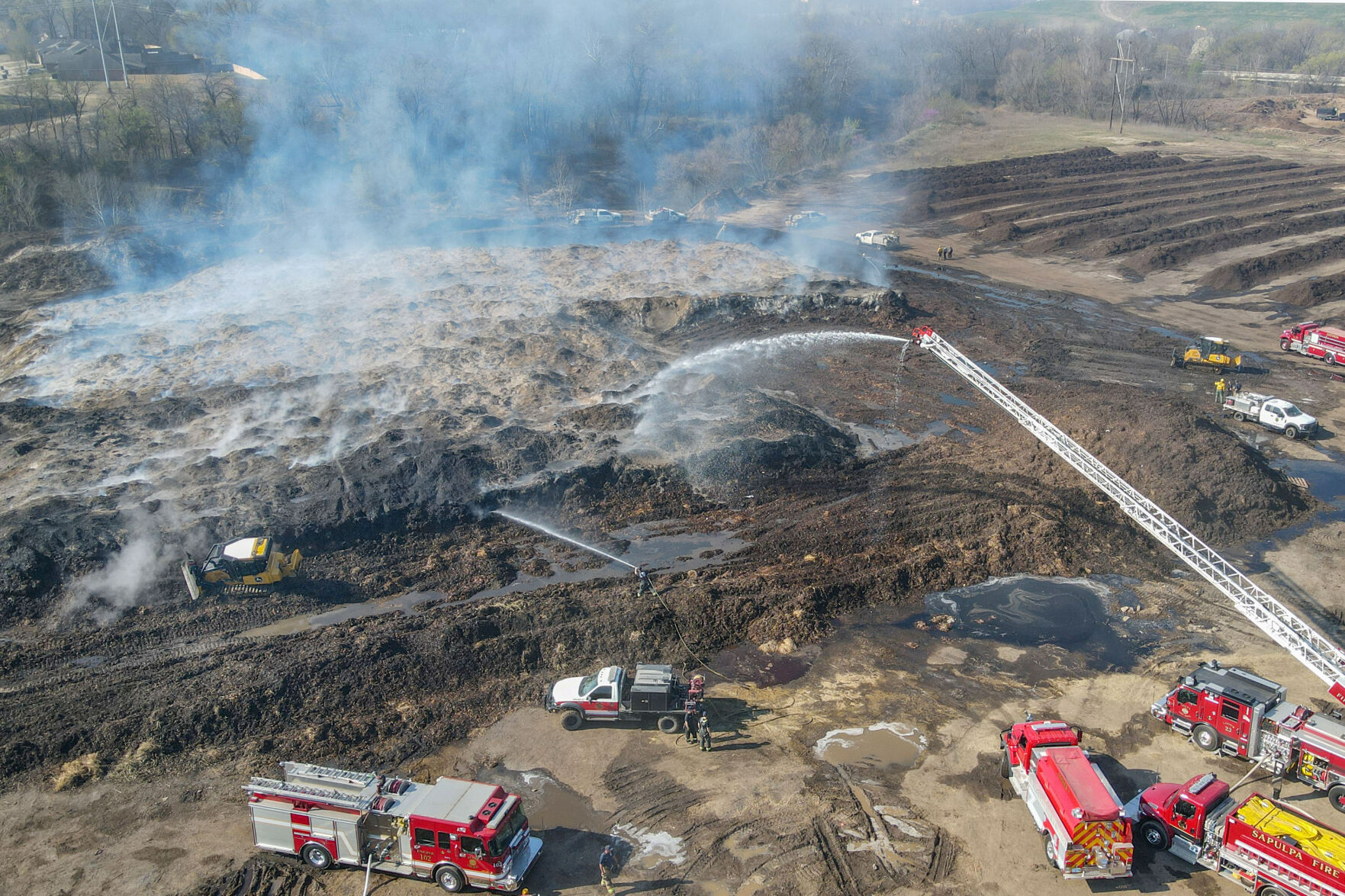Crews still battling fire at Gem Dirt in Jenks