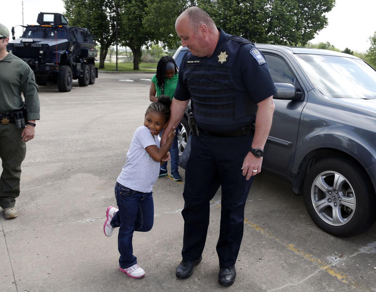 This 7-year-old is on a mission to hug a cop in all 50 states. Her stop ...