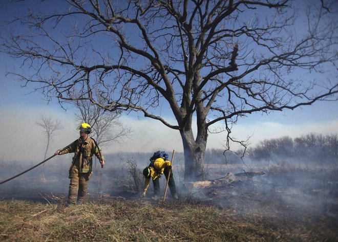 Grass fires raging through area counties