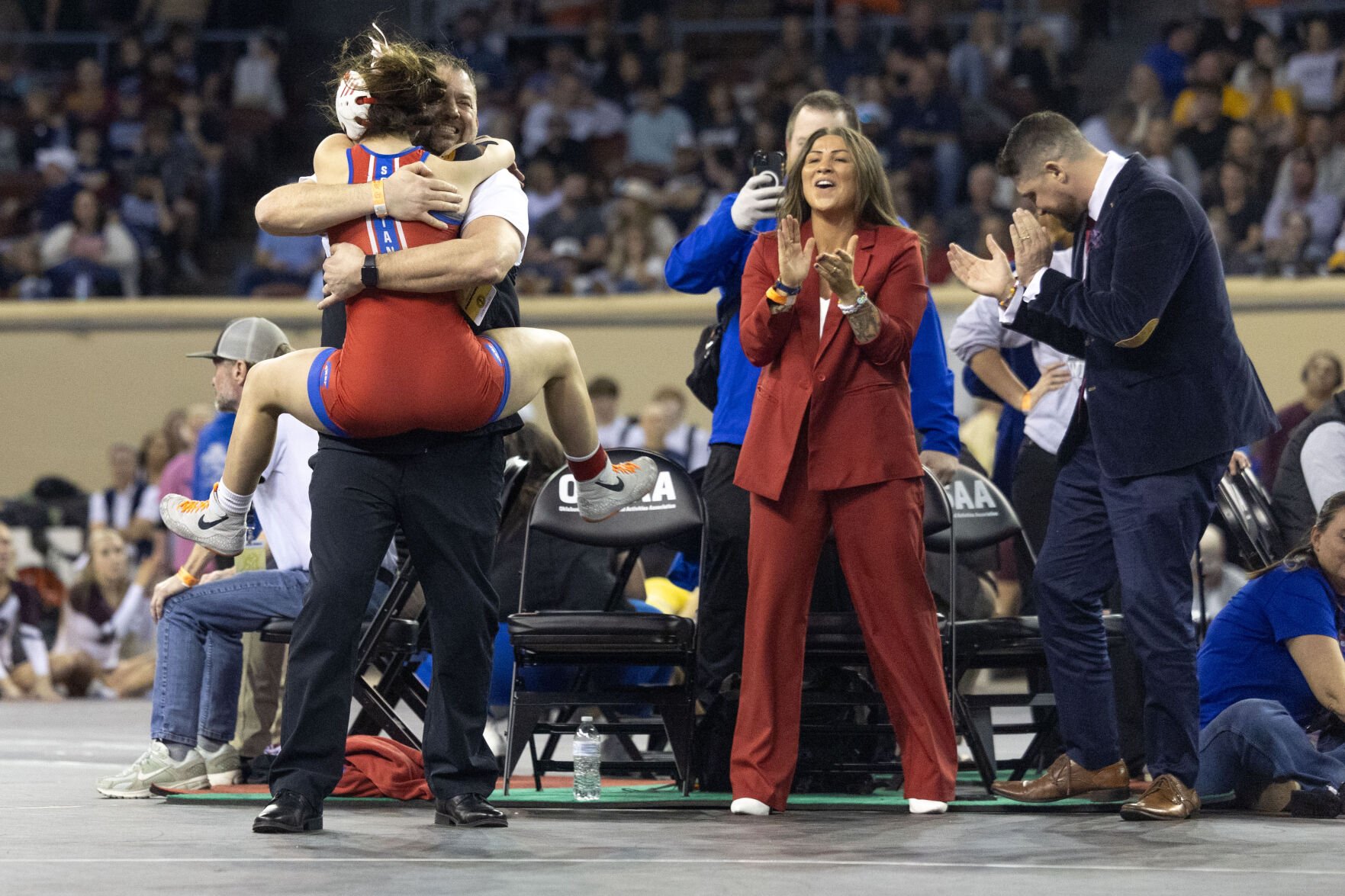 Oklahoma's first father-daughter four-time state champions