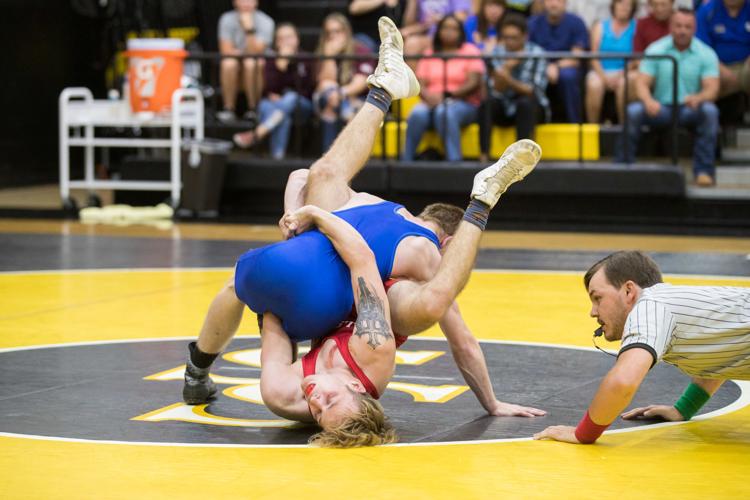 All-State Wrestling: Too small for other sports, McLain's Thaddeus Long ...