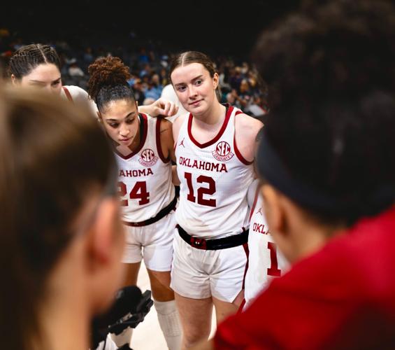 Six OU players wearing SEC graduate patches