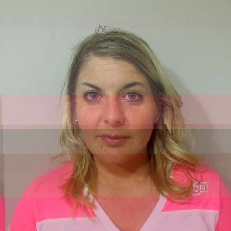 Sequoyah County jailer arrested in assault with whiskey bottle