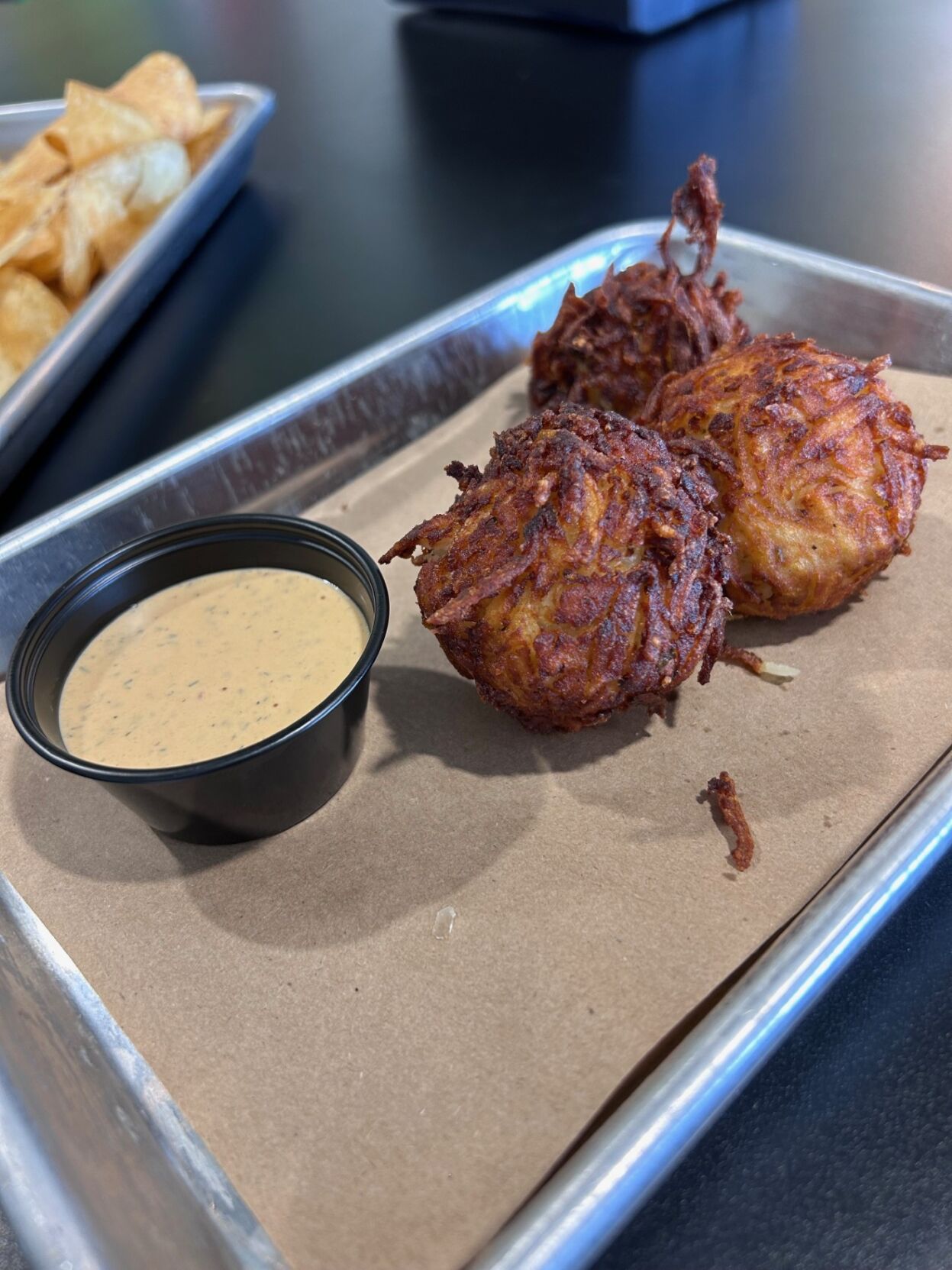 Courts & Commons food court has three dining options, bar