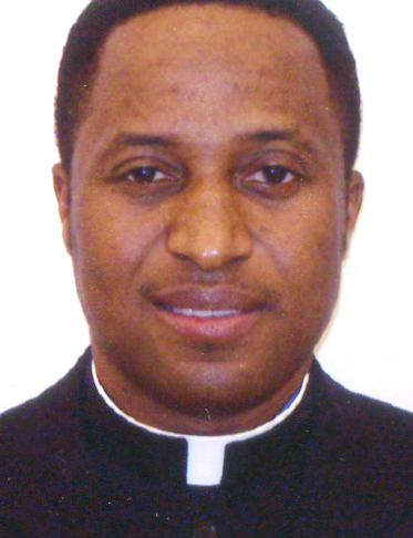 Global journey for priest leads to Sand Springs