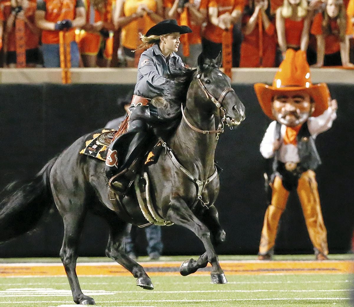 Watch OSU spirit horse Bullet buck rider during band pregame