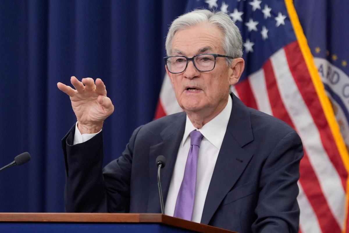 Fed lowers key interest rate for third consecutive time