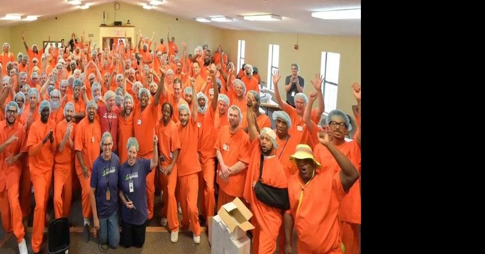 Jess Dunn inmates pack thousands of meals for refugees, needy