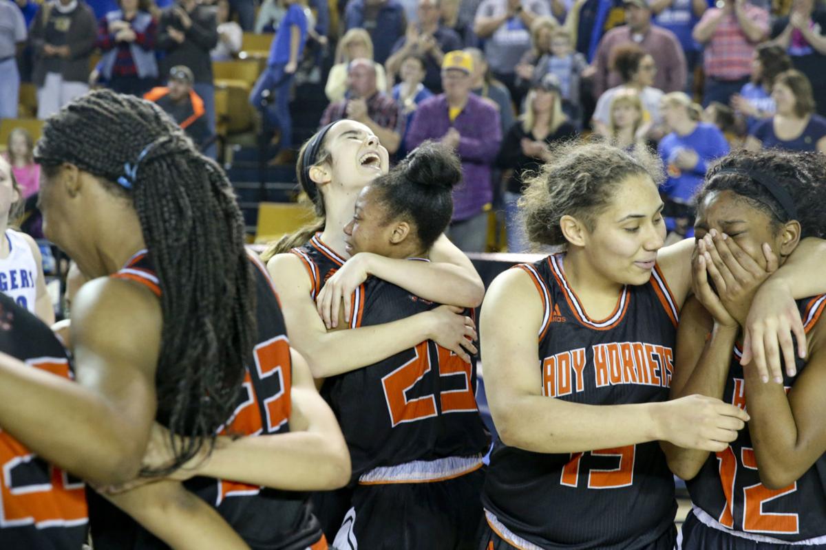 High schools: Booker T. Washington basketball moving back up to 6A