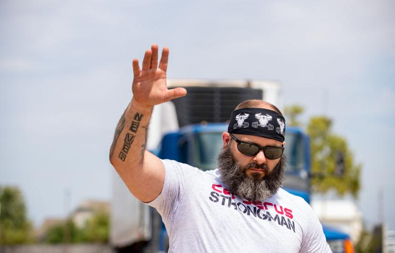 Might and muscle: Collinsville strongman pulls 17-ton semi