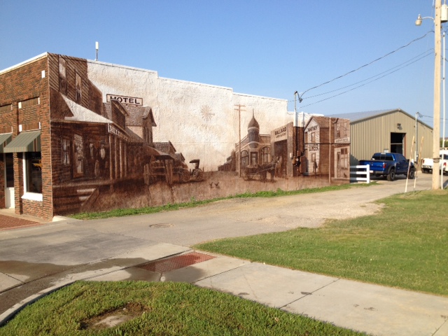 Mural on side of Owasso Historical Museum depicts early 1900s scene