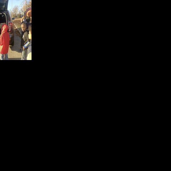 Tulsa Police Gang Unit passes out coats to local children