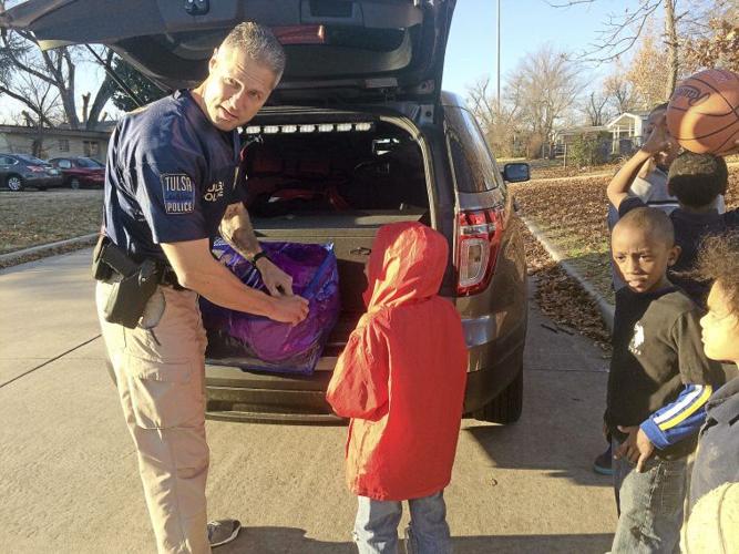 Tulsa Police Gang Unit passes out coats to local children