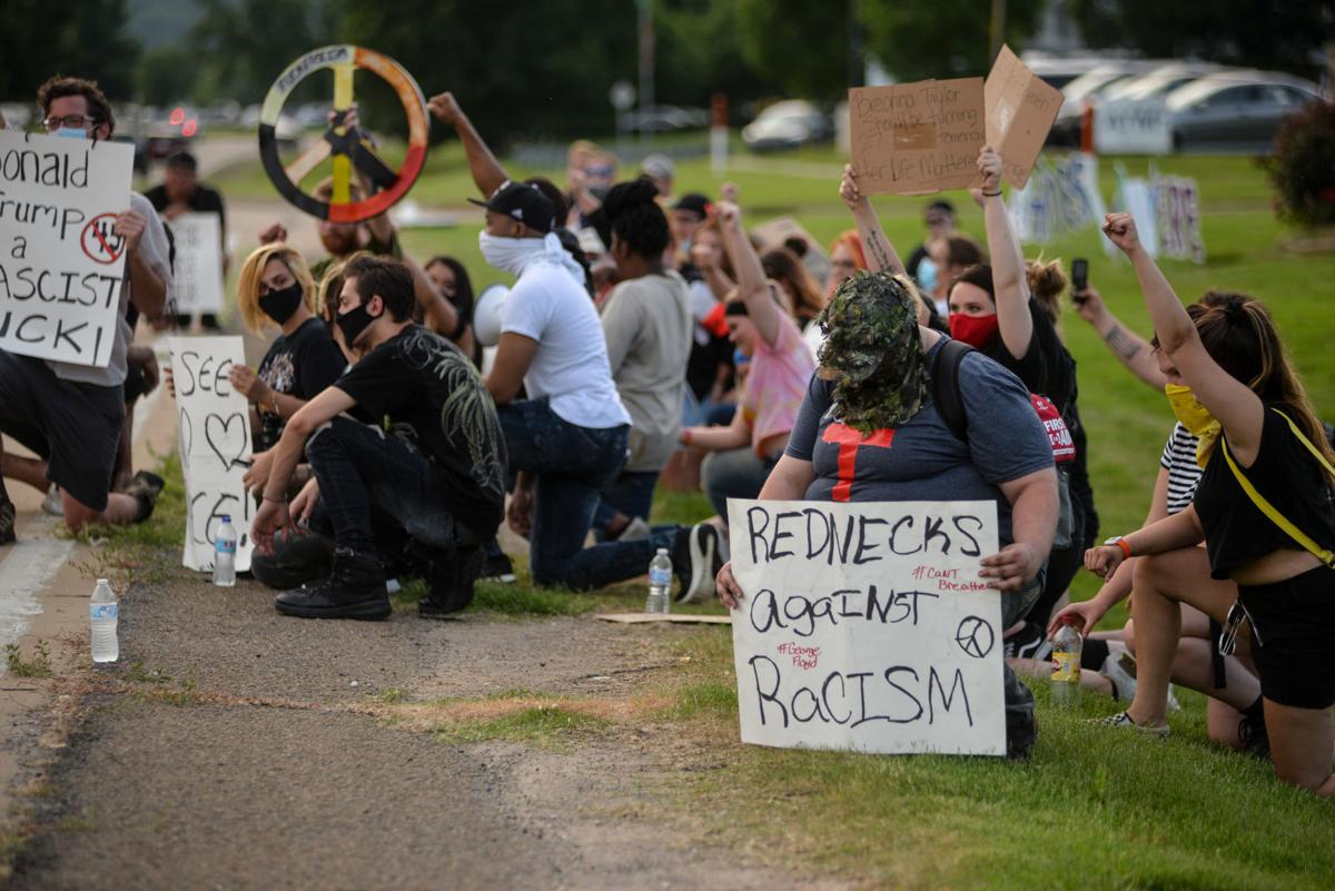 Peaceful demonstrators protest racial injustice outside three Tulsa ...