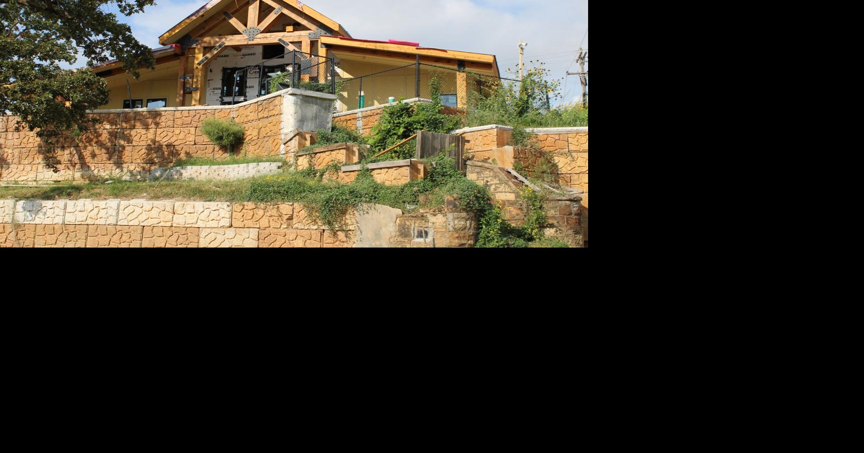 Two Sandites near completion on dream home after a decade